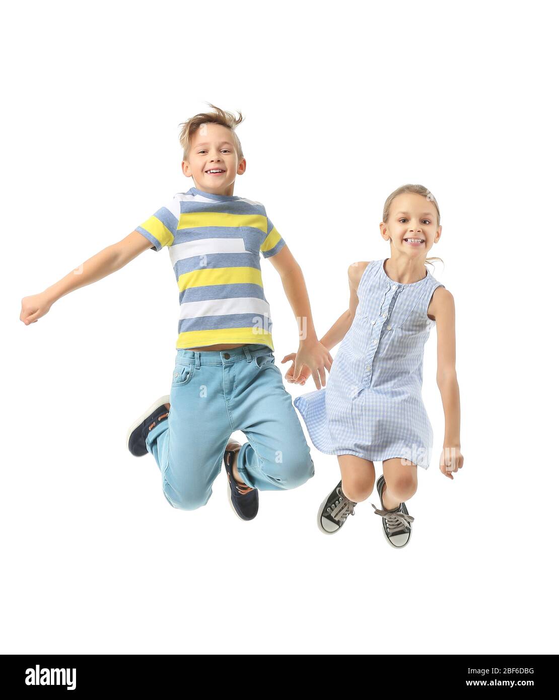 Jumping little children on white background Stock Photo - Alamy