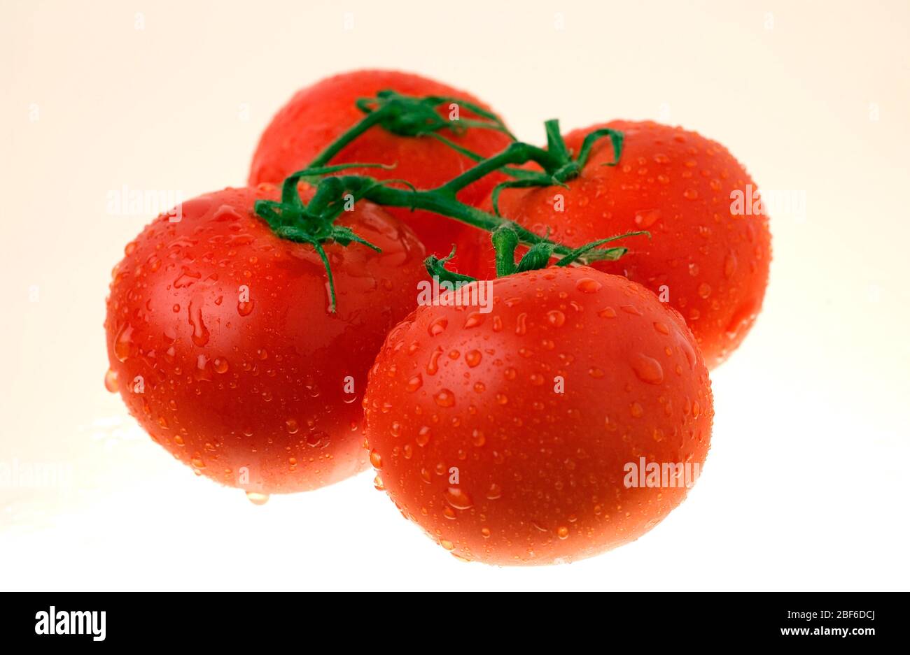 Bunch 4 tomatoes hi-res stock photography and images - Alamy