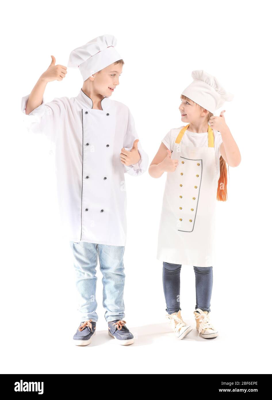 Cute little chefs on white background Stock Photo - Alamy