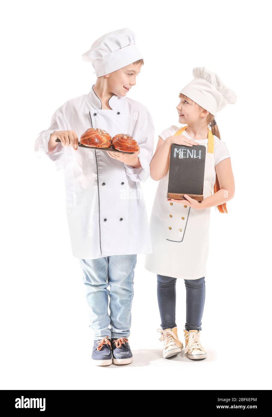 Cute little chefs on white background Stock Photo - Alamy