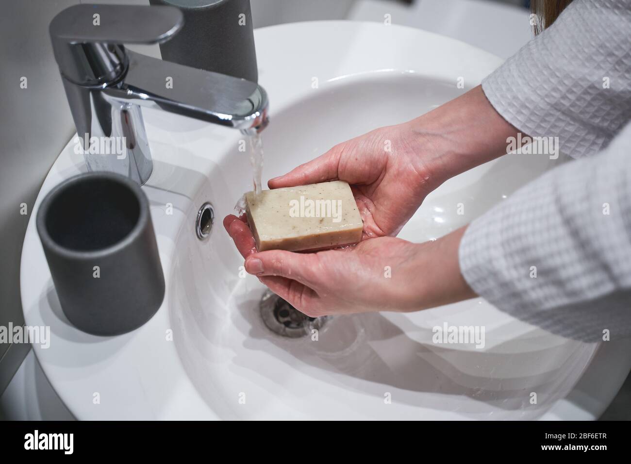Woman washing hands bar soap hi-res stock photography and images - Alamy