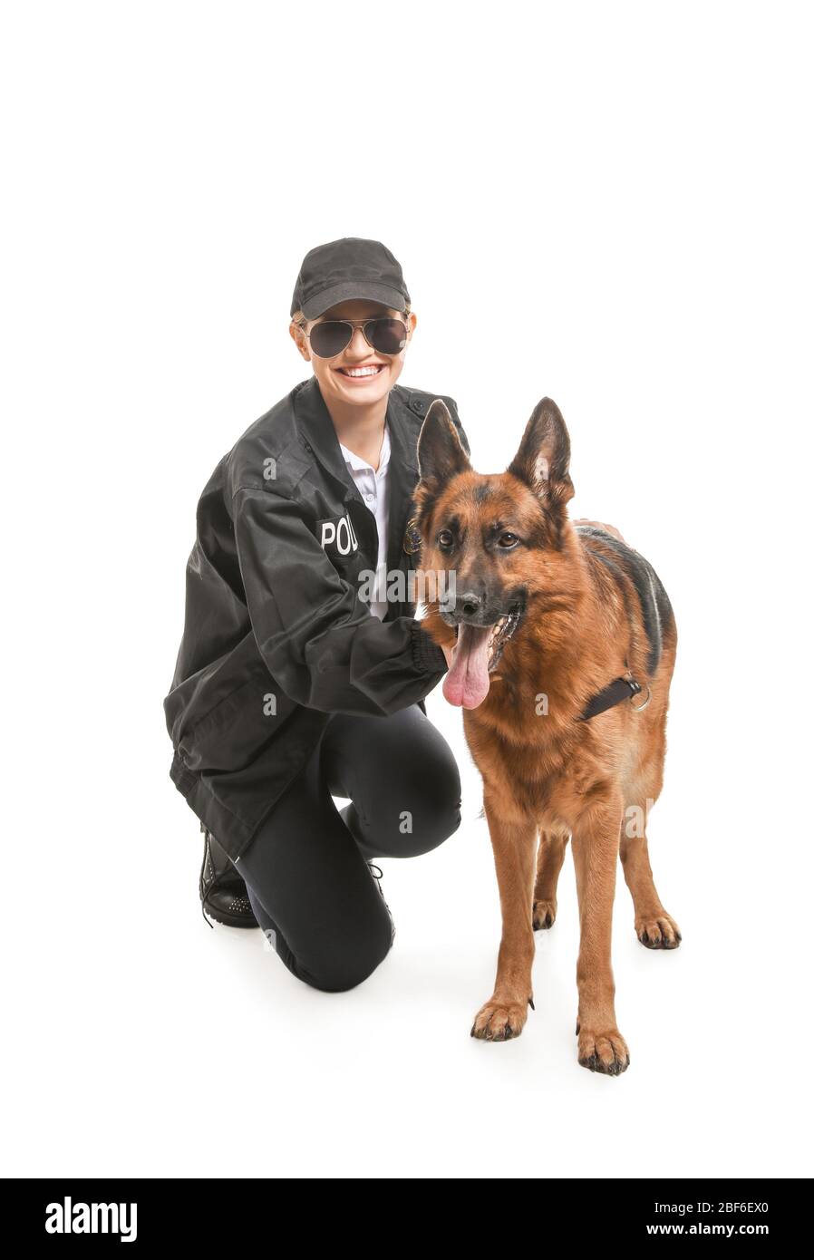 Female police officer with dog on white background Stock Photo - Alamy