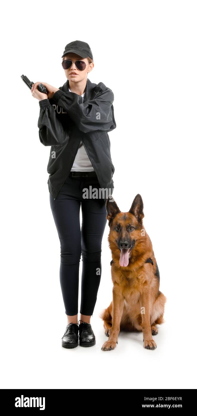 Female police officer with dog on white background Stock Photo - Alamy