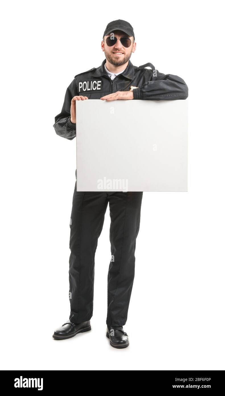 Male police officer with blank poster on white background Stock Photo ...