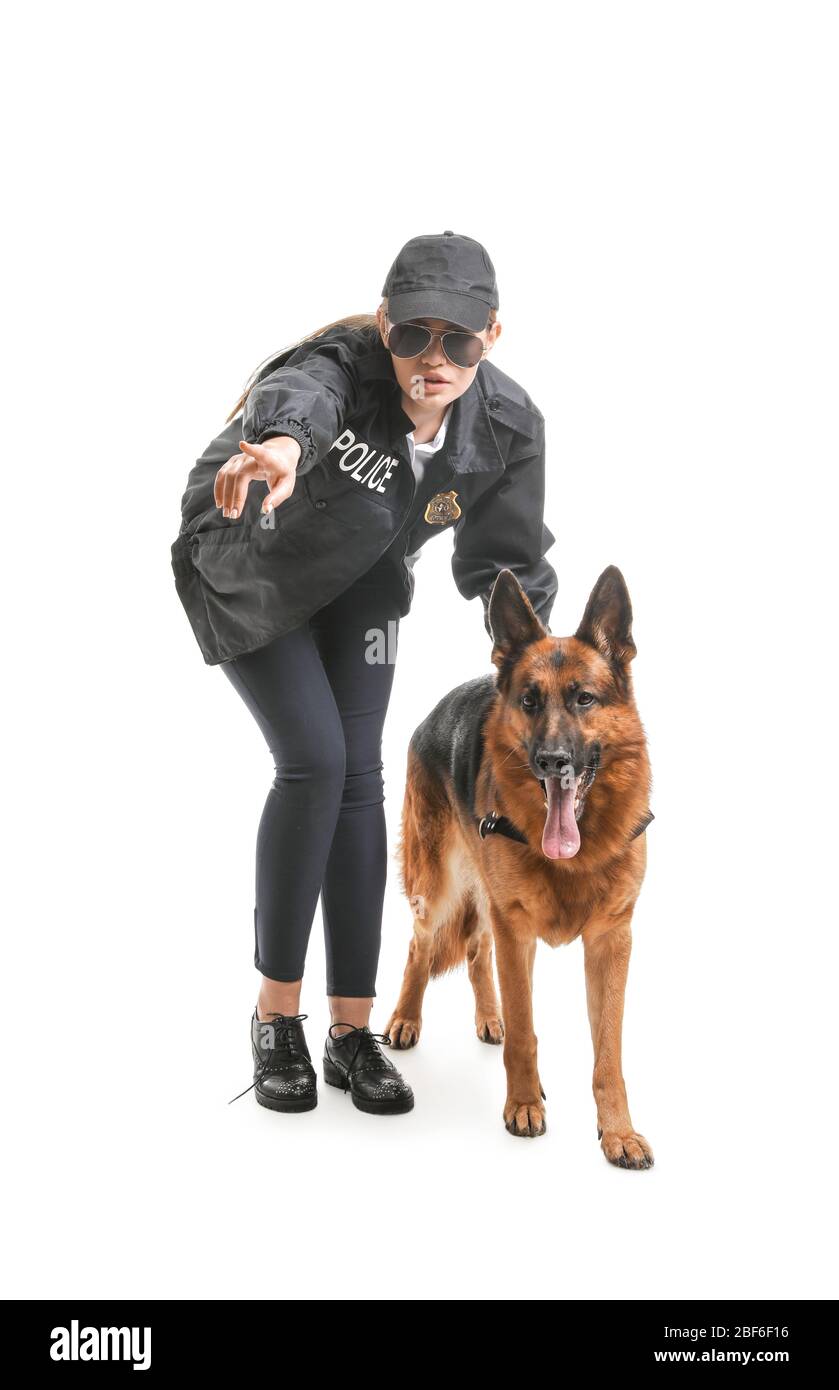 Female police officer with dog on white background Stock Photo - Alamy