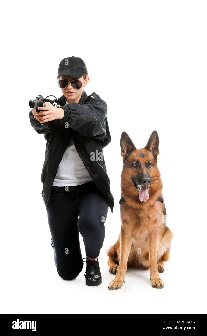 Female police officer with dog on white background Stock Photo - Alamy