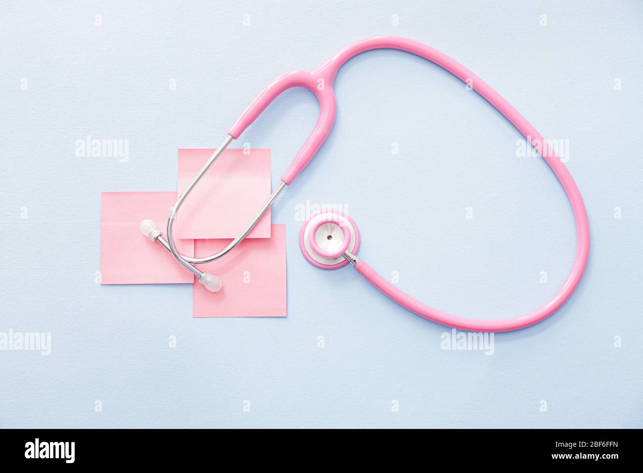 Stethoscope with paper sheets on white background. Cardiology concept ...