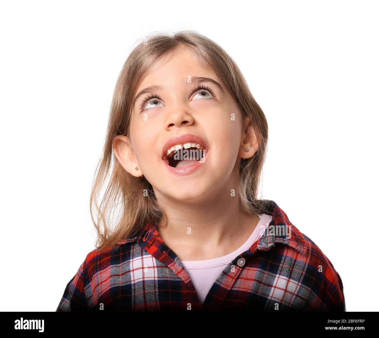 Happy little girl with healthy teeth on white background Stock Photo ...