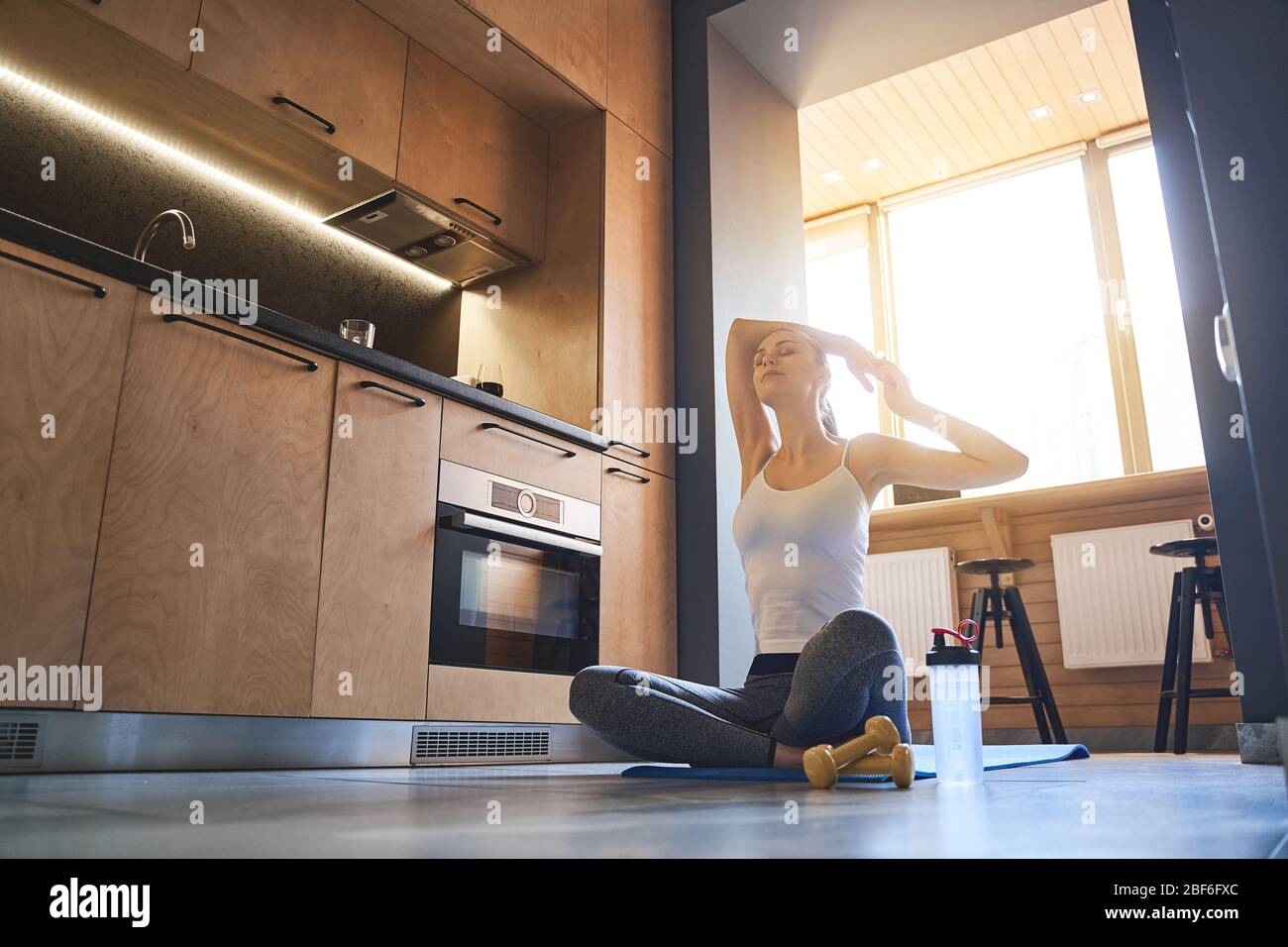 Fit young woman working out at home Stock Photo - Alamy