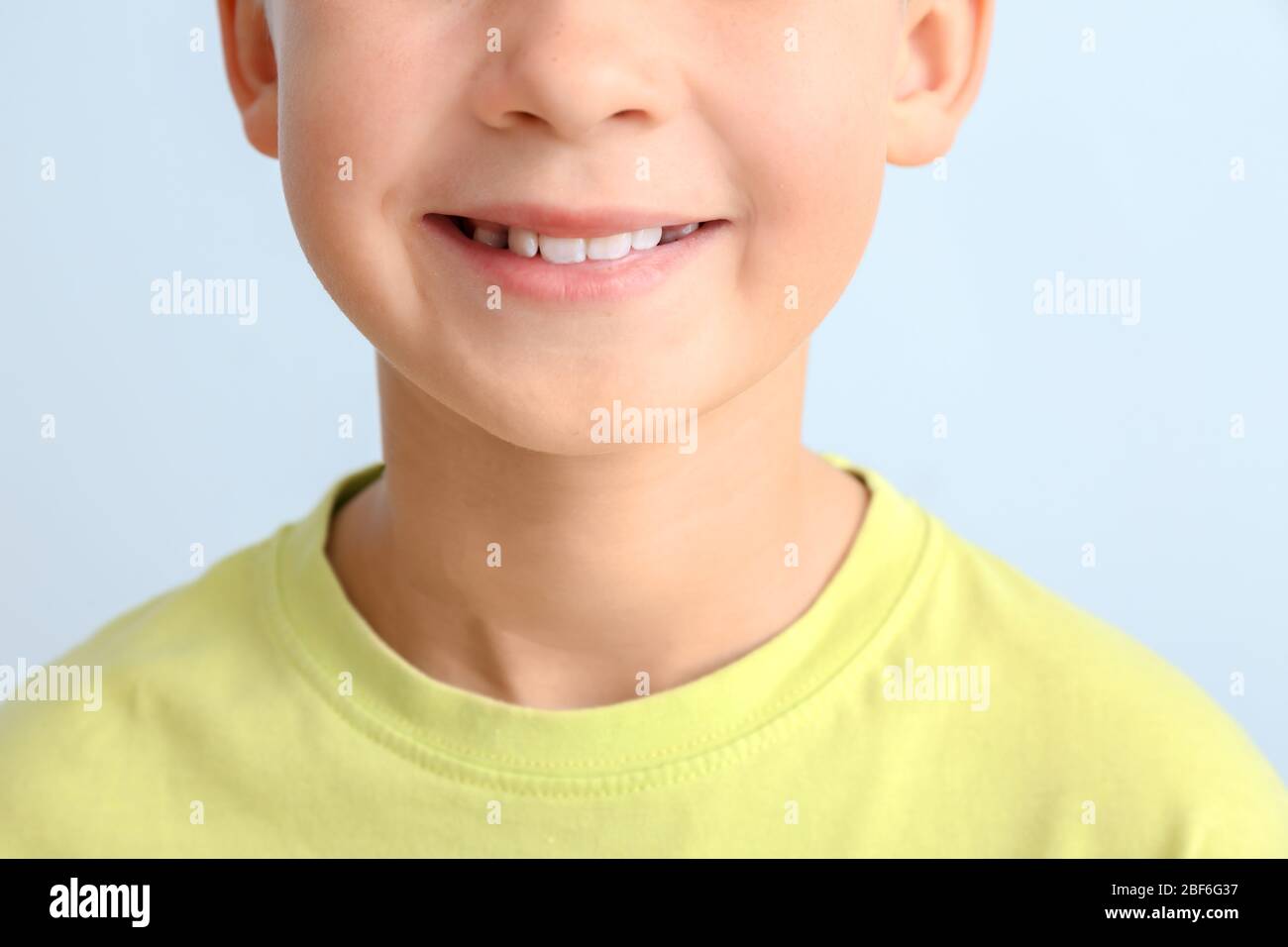Happy little boy with healthy teeth on white background, closeup Stock ...