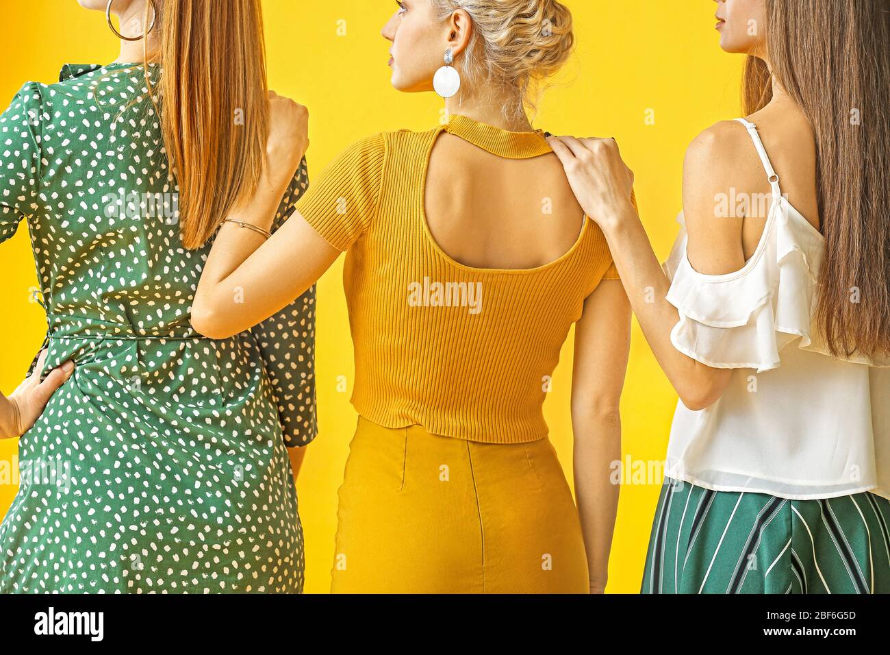 Beautiful young women on color background. Unity concept Stock Photo ...