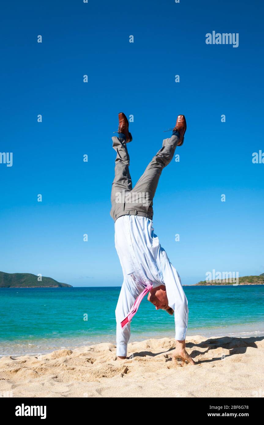 Businessman doing handstand hi-res stock photography and images - Alamy