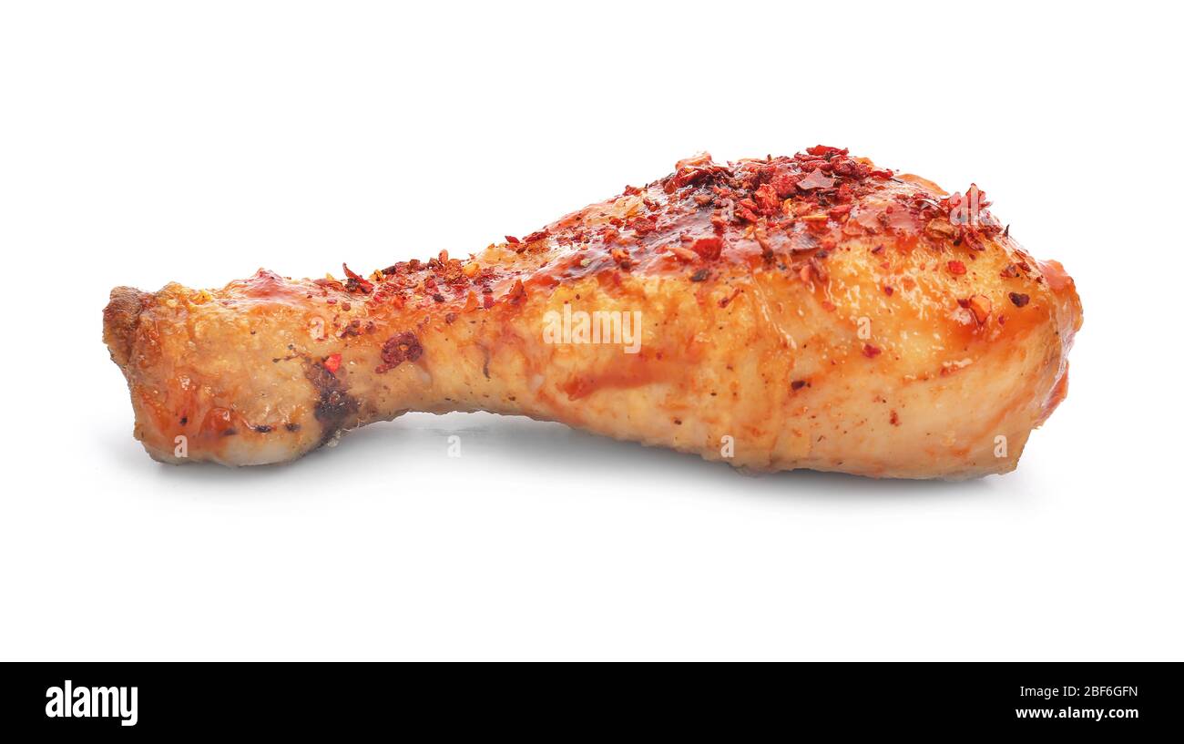 Cooked chicken drumstick on white background Stock Photo - Alamy