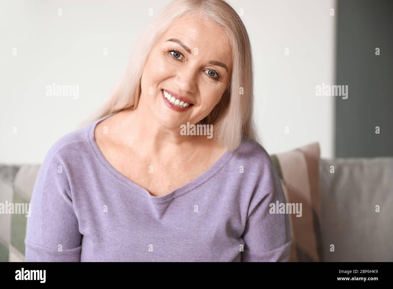 Mature woman using video chat at home Stock Photo - Alamy