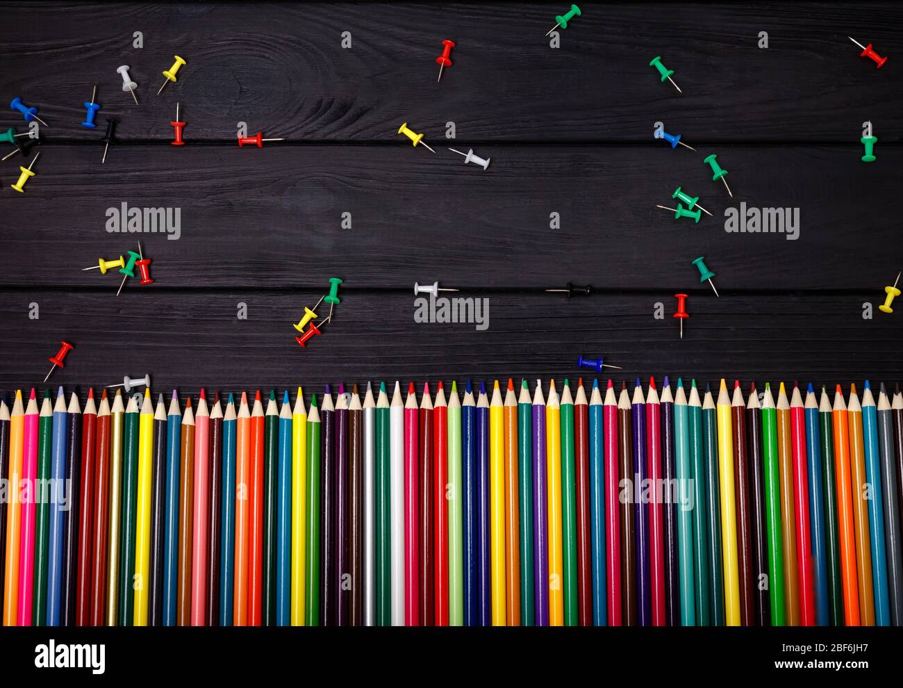 School background. Color pencils on black background. Top view, layout ...