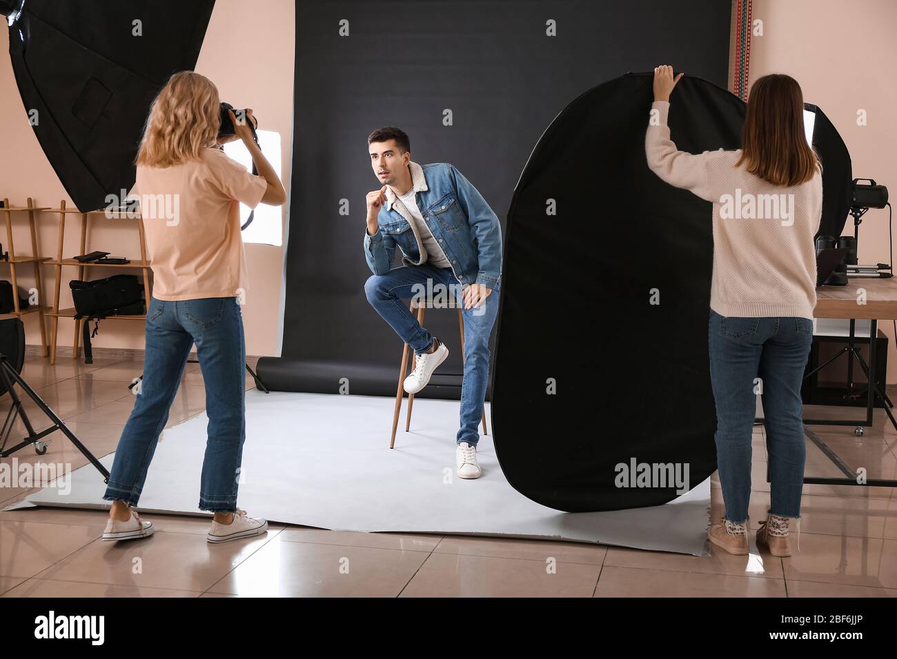 Professional photographer model assistant digital hi-res stock ...