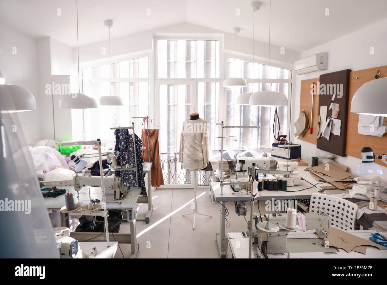 Interior of modern tailor workshop Stock Photo - Alamy