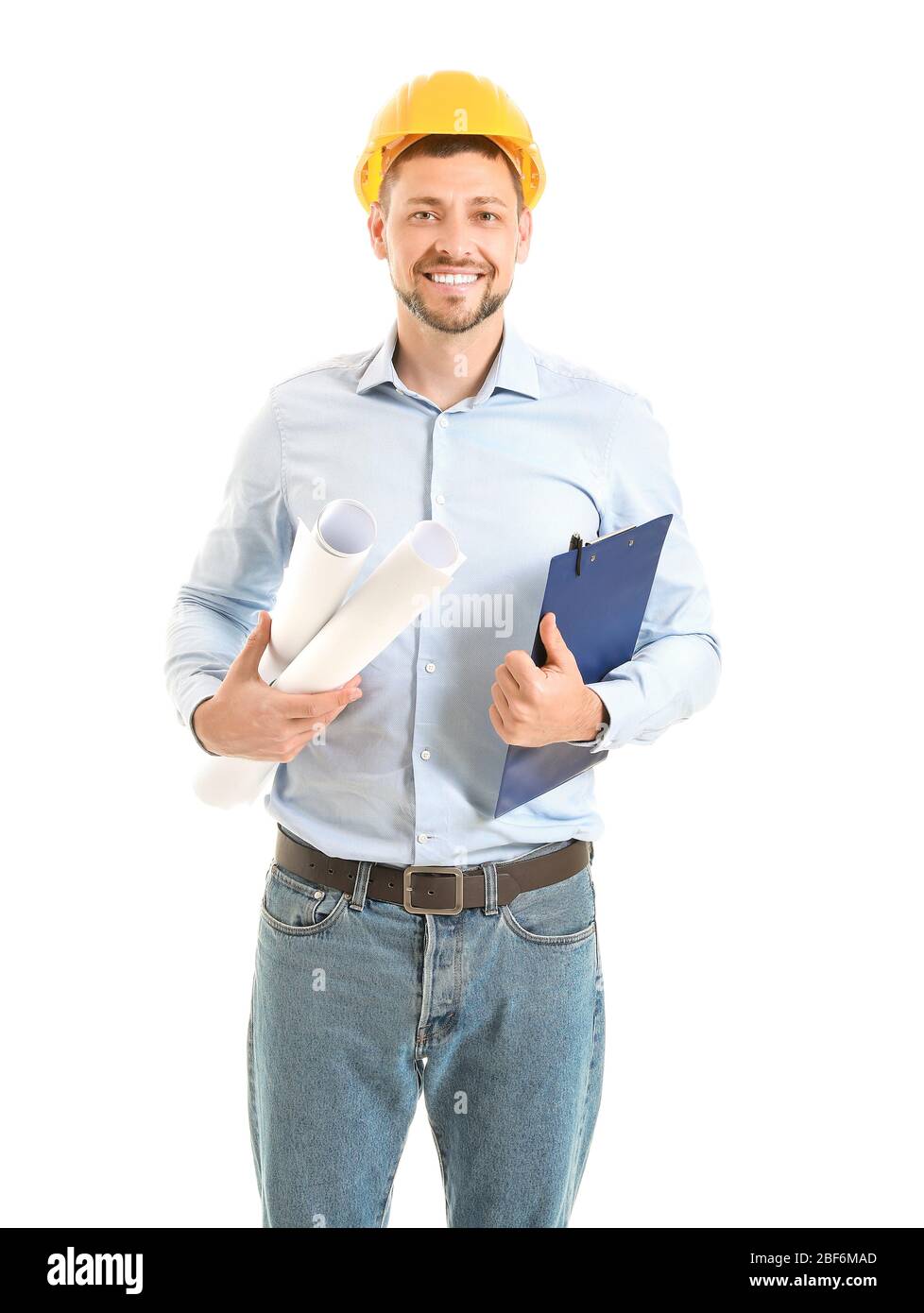 Male engineer with drawings on white background Stock Photo - Alamy