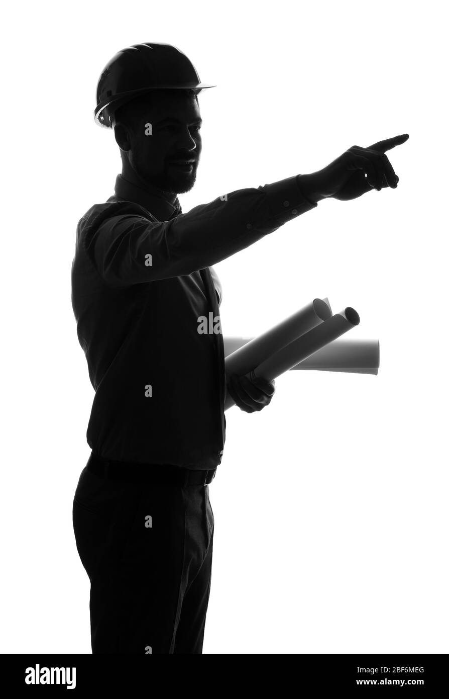 Silhouette of male engineer with drawings showing something on white ...