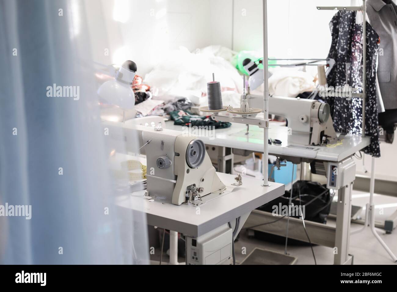 Interior of modern tailor workshop Stock Photo - Alamy