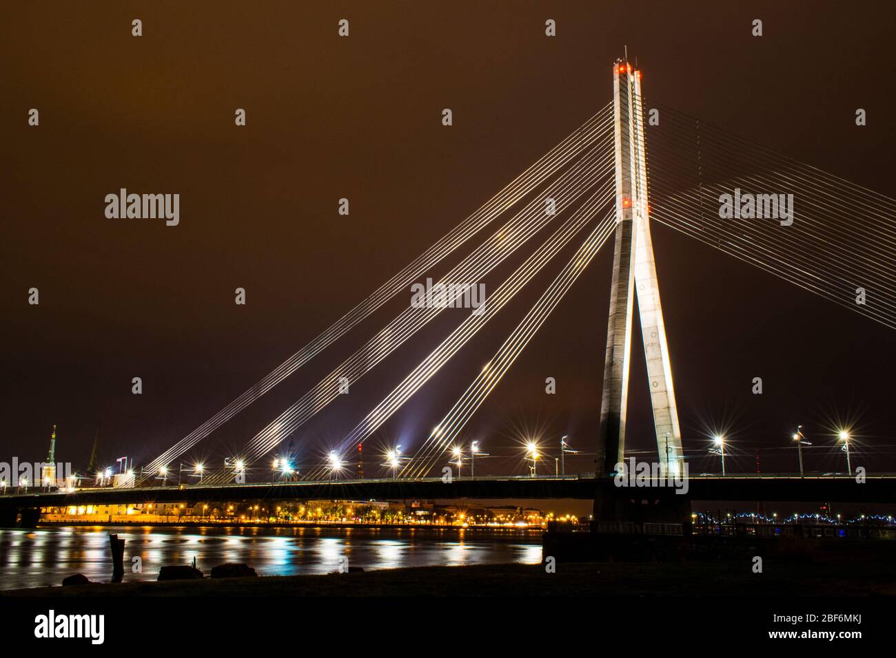 Suspension bridge at night Stock Photo - Alamy