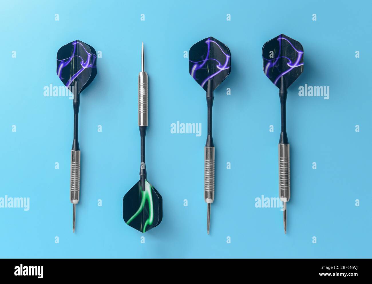 Darts on color background, top view Stock Photo - Alamy