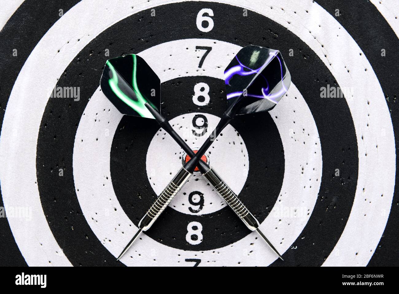 Darts on dartboard, top view Stock Photo - Alamy