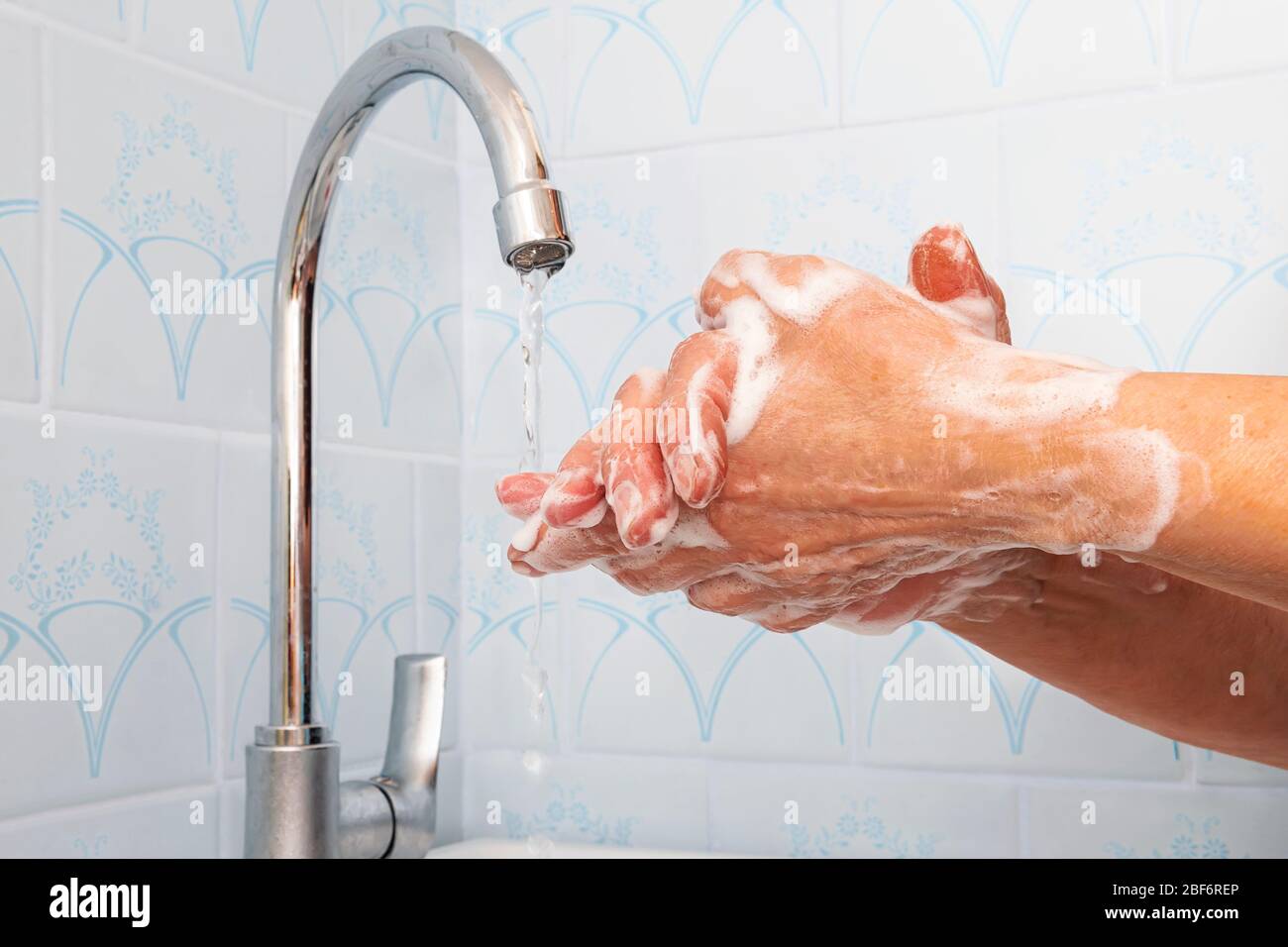 Washing hands rubbing with soap woman for winter flu virus prevention ...