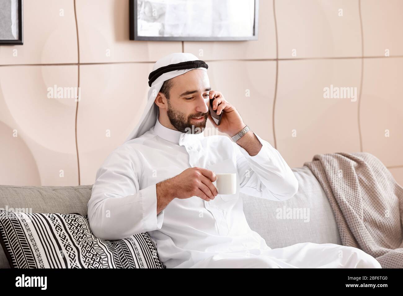 Coffee drinking home arab man hi-res stock photography and images - Alamy