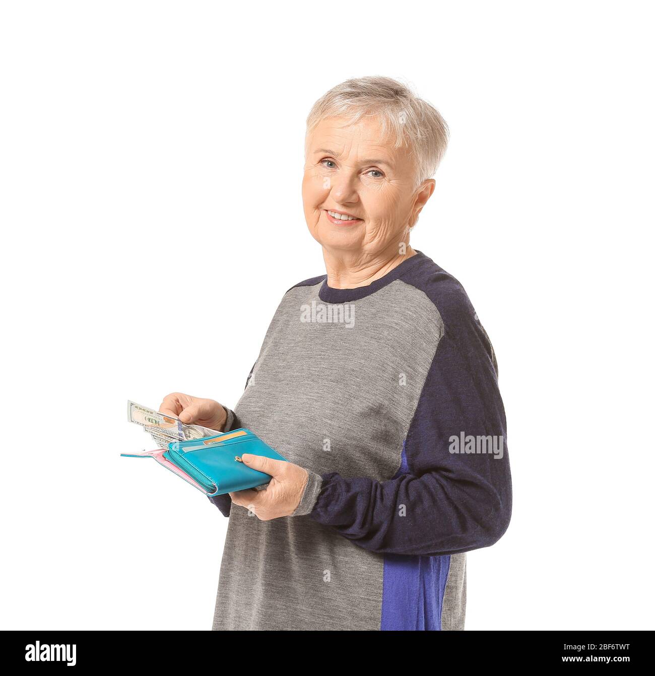 Senior woman with wallet on white background Stock Photo - Alamy