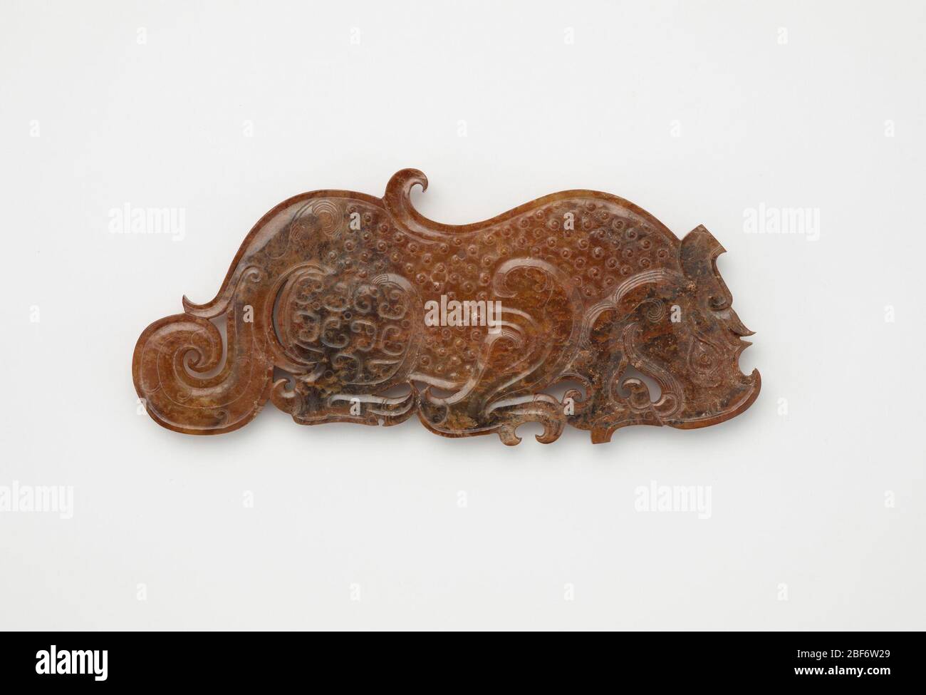 Pendant in the form of a crouching tiger. C.T. Loo & Company (1914 ...