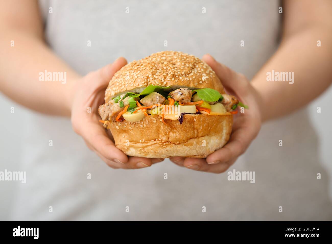 Woman holding kebab hi-res stock photography and images - Alamy