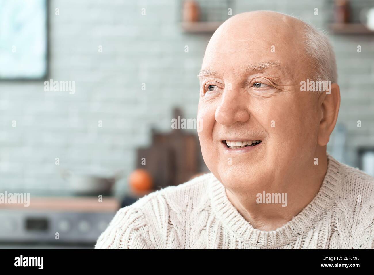 Portrait of elderly man at home Stock Photo - Alamy