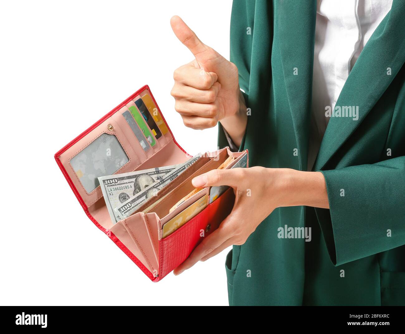 Young woman with wallet on white background, closeup Stock Photo - Alamy