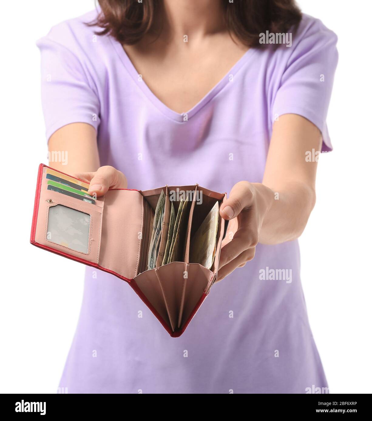 Young woman with wallet on white background Stock Photo - Alamy