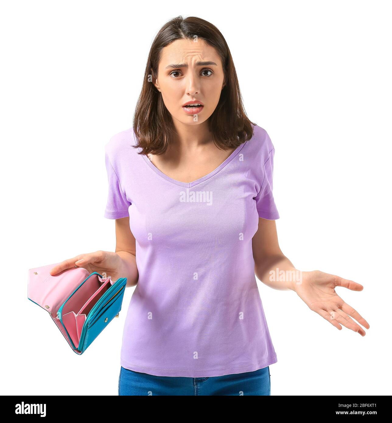 Worried young woman with empty wallet on white background Stock Photo ...