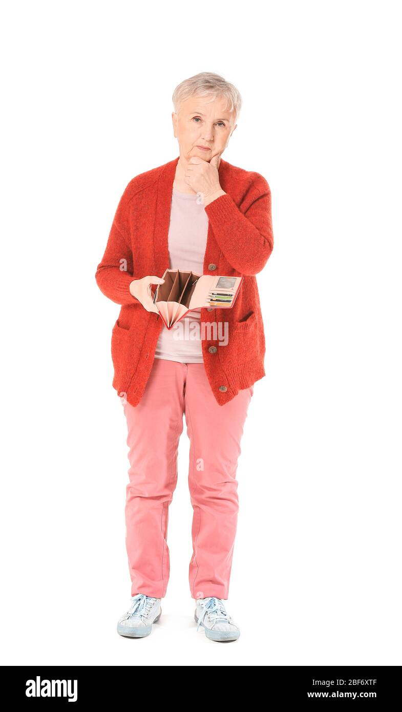Senior woman with empty wallet on white background Stock Photo - Alamy