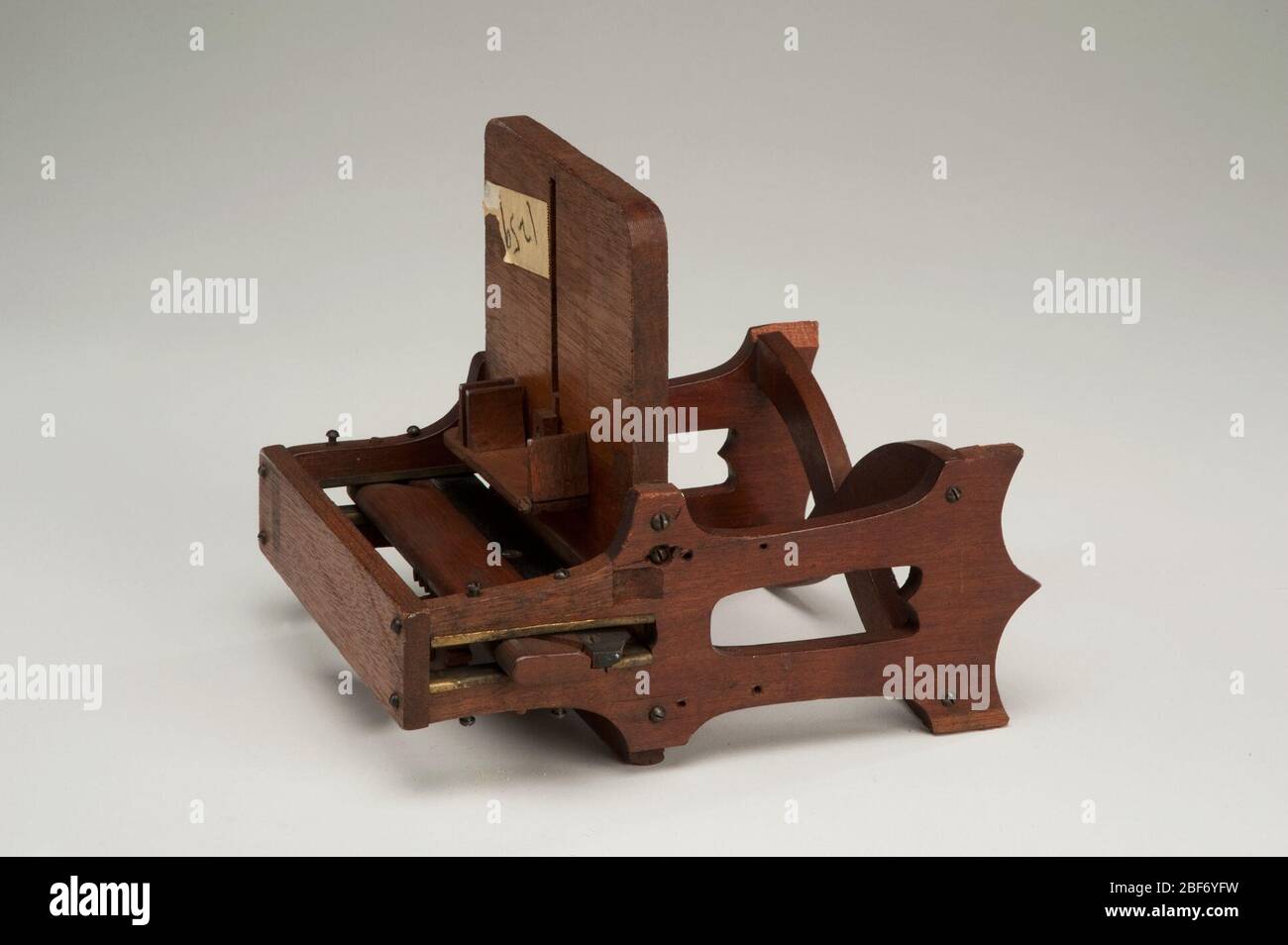 Patent model for paper cutting machine. This patent model demonstrates ...