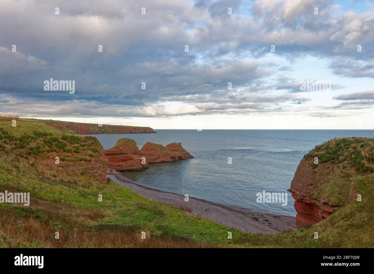 The Three Sisters cliffs stretching out into the North Sea from Cove ...