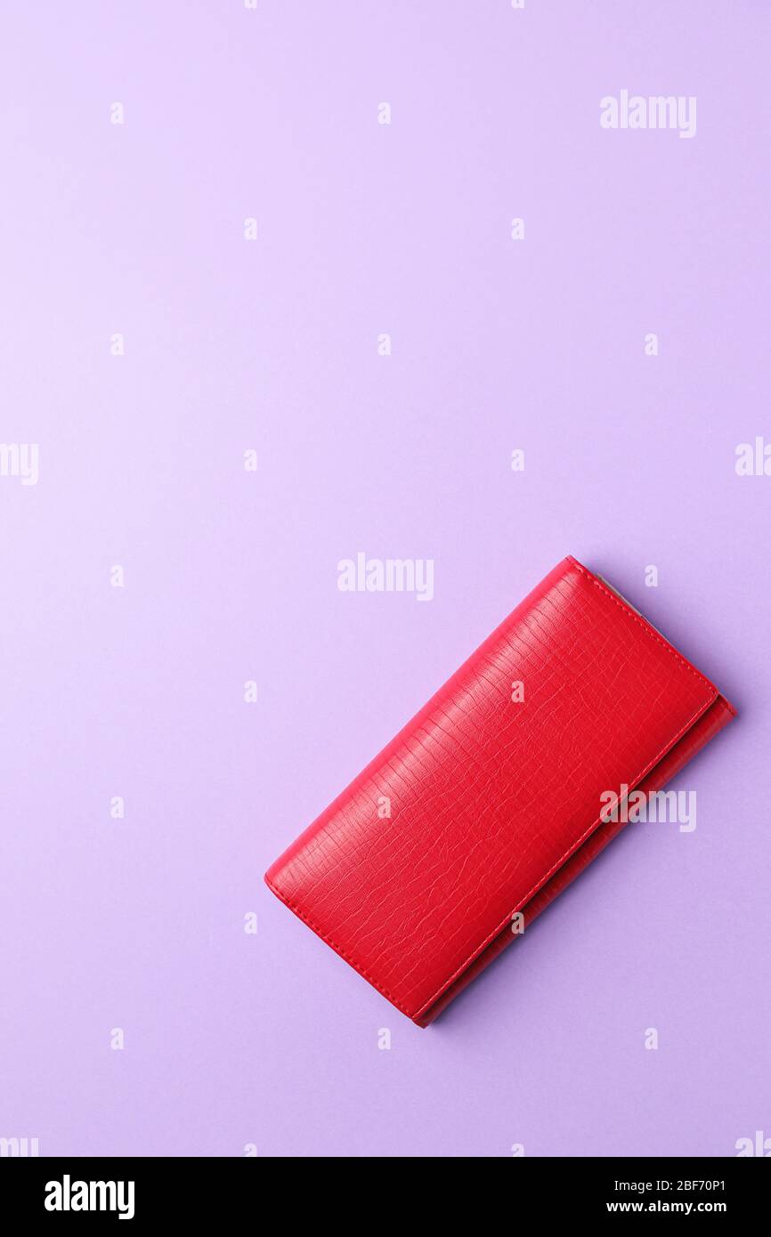 Stylish wallet on color background Stock Photo - Alamy