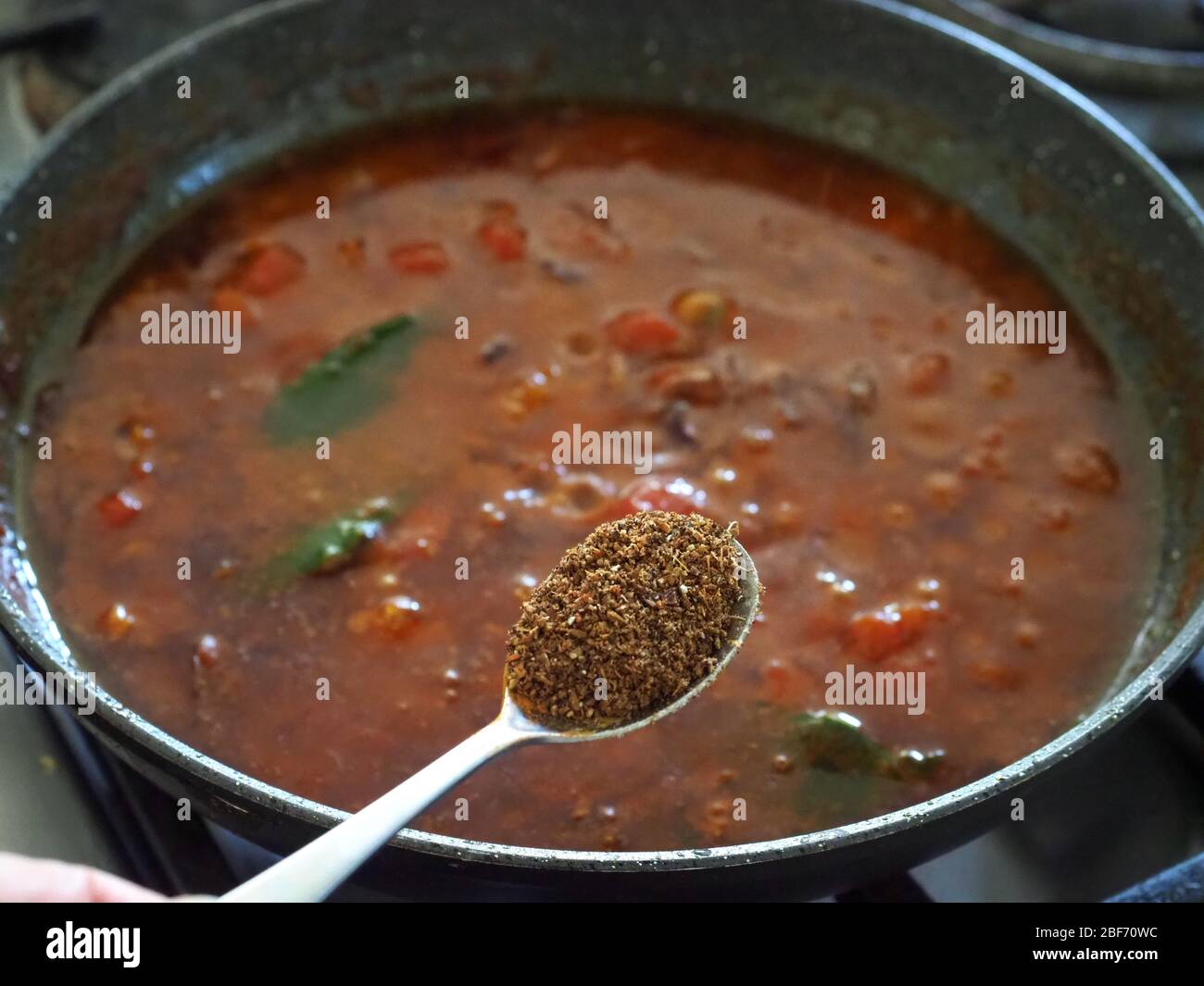Indian spices in a pan hi-res stock photography and images - Alamy