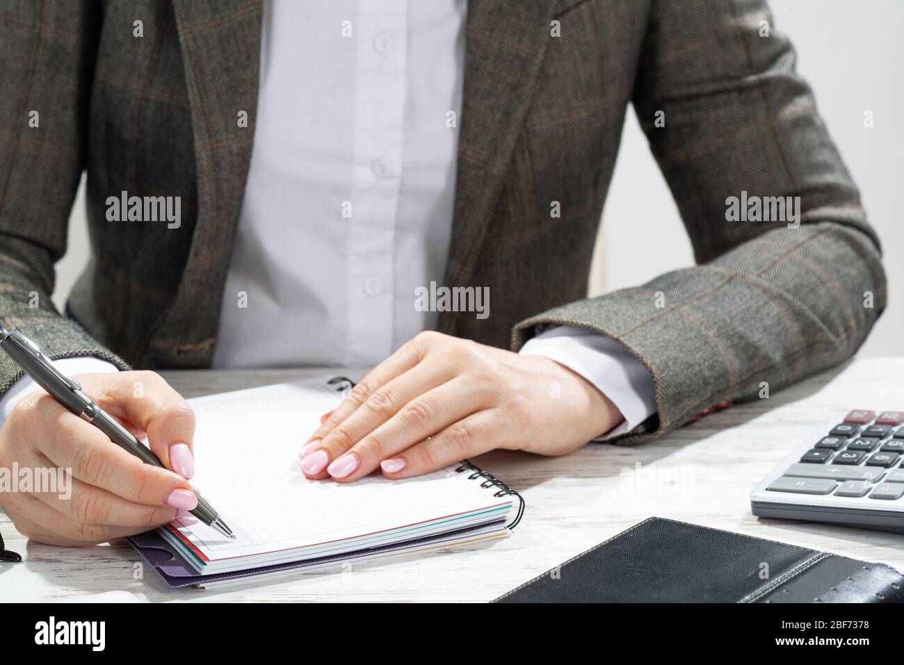 Close up woman hand holding pen Stock Photo - Alamy