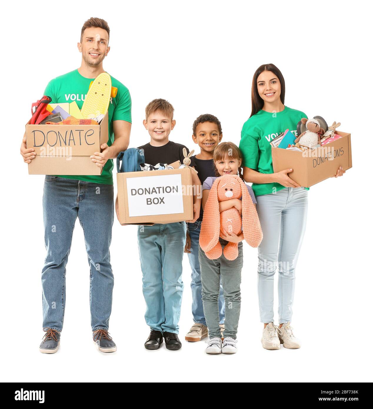 Volunteers with donations for orphans on white background Stock Photo ...