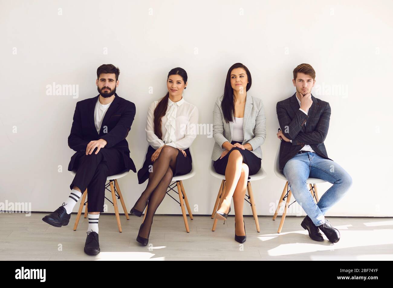 Business people waiting for job interview recruitment sitting on a ...