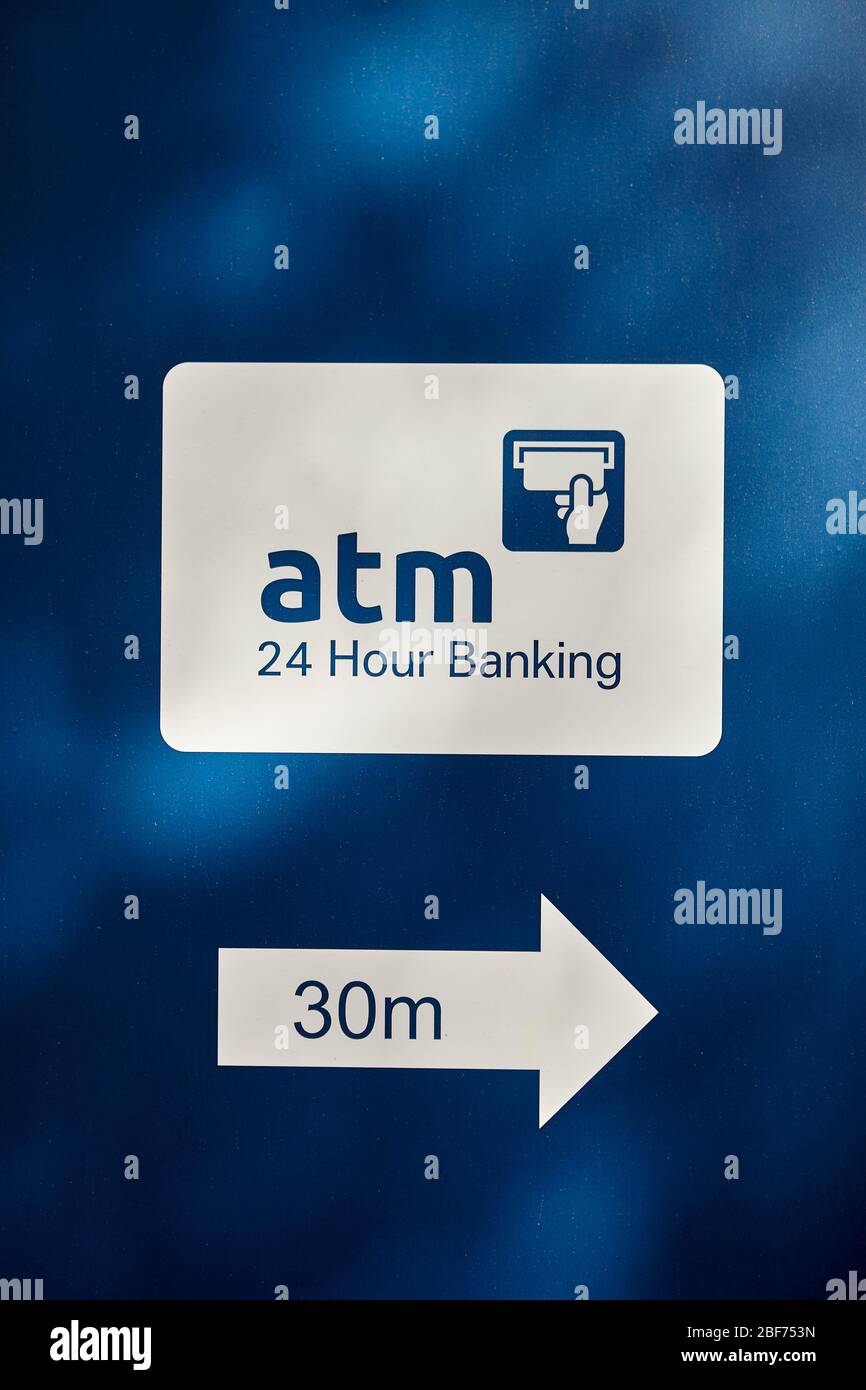 Bank atm sign, 24 hour banking Stock Photo - Alamy
