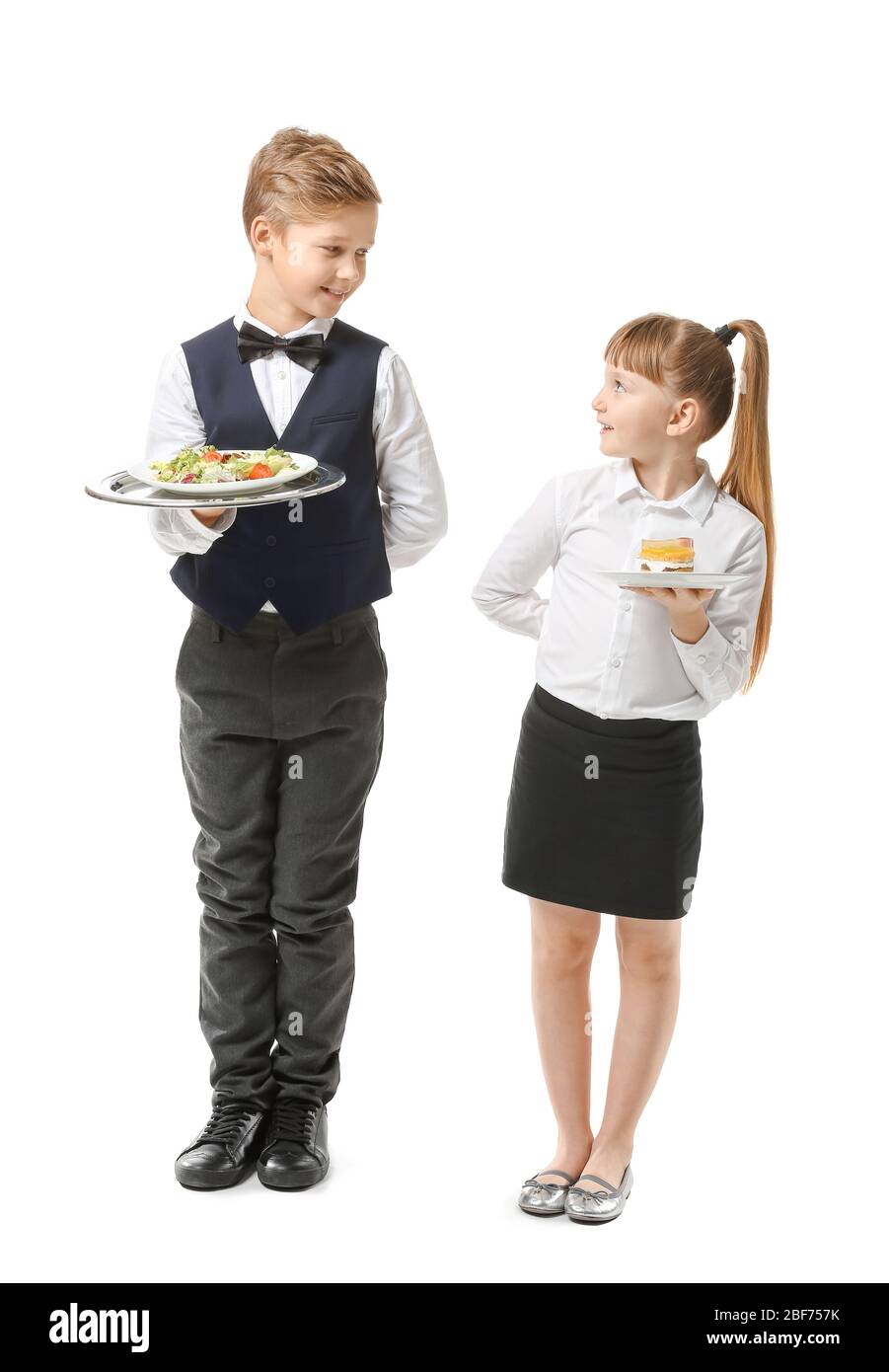 Cute little waiters on white background Stock Photo - Alamy