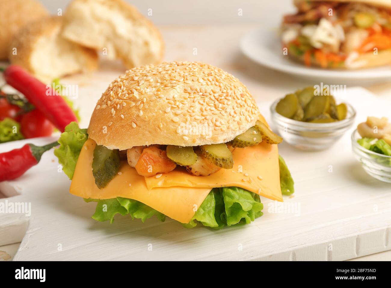Tasty doner kebab in bun on table Stock Photo - Alamy