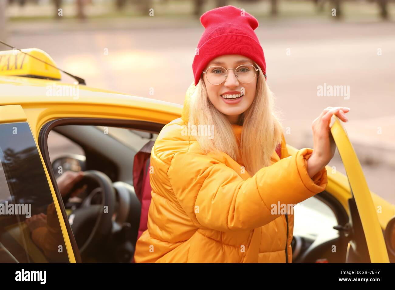 Woman Getting In Taxi High Resolution Stock Photography and Images - Alamy