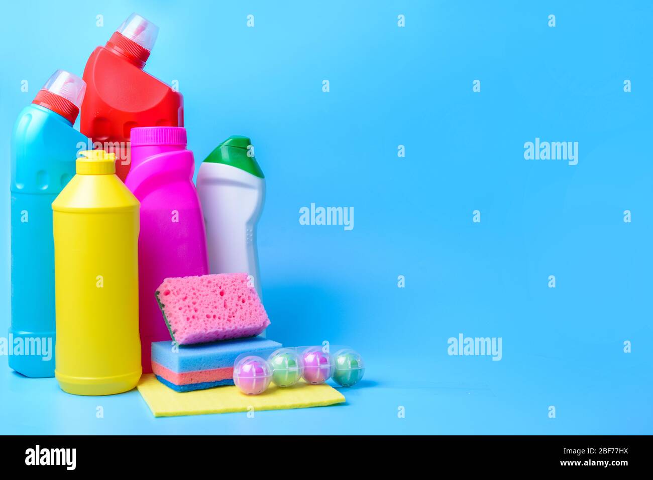 Set of cleaning supplies on color background Stock Photo - Alamy