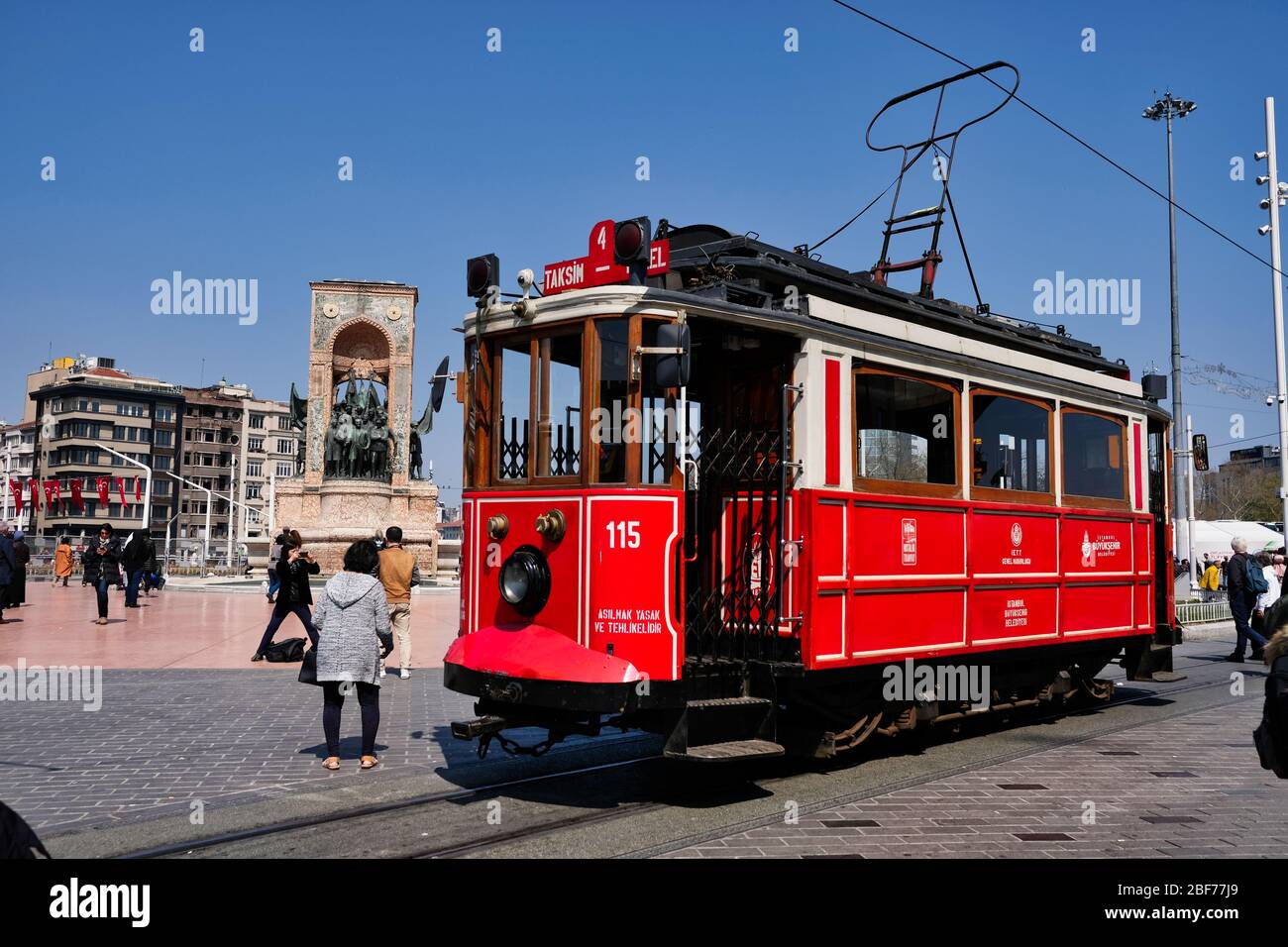 Nostalgic Red Tram in Taksim Istiklal Street at noon. Taksim Istiklal ...